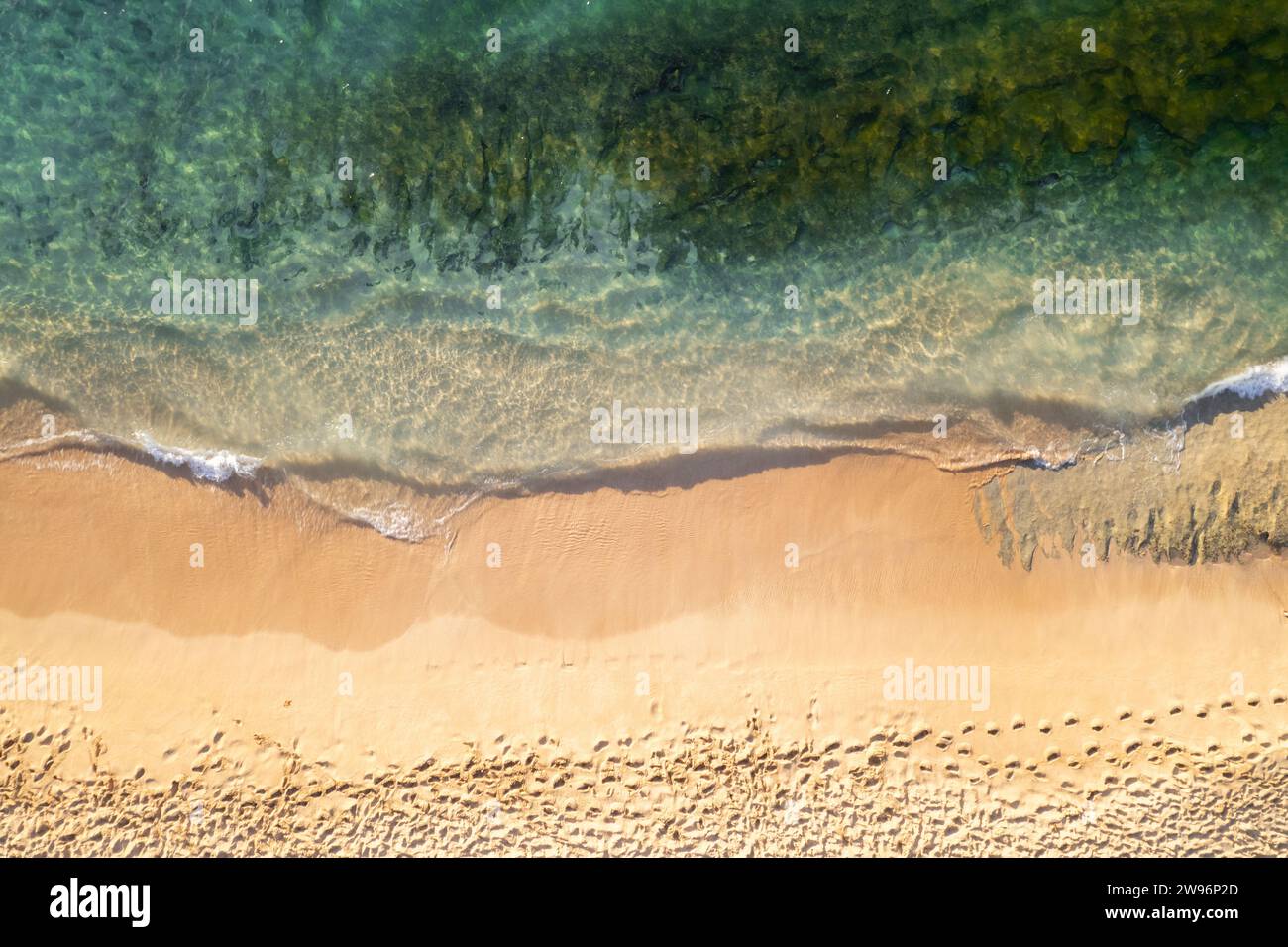Top Down View of Waves on a Beach Stock Photo - Alamy
