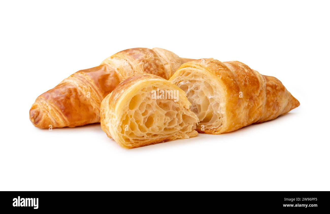 single piece of croissant with two halves is isolated on white ...