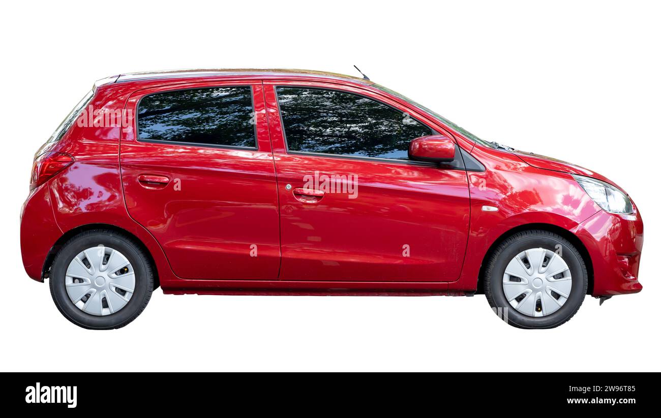 red hatchback car is isolated on white background with clipping path ...