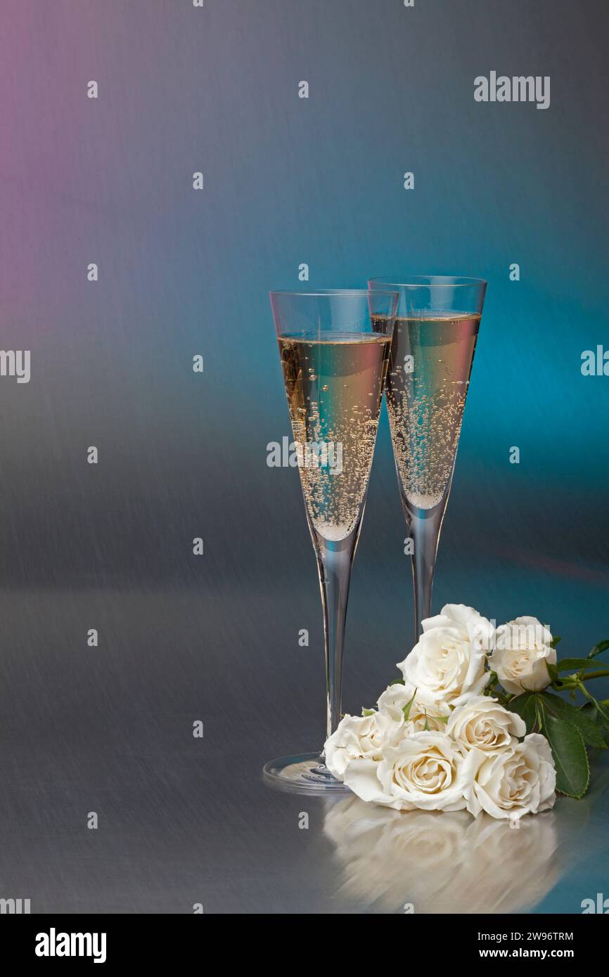 A still life of Two classes of bubbly champagne in elegant Champagne ...
