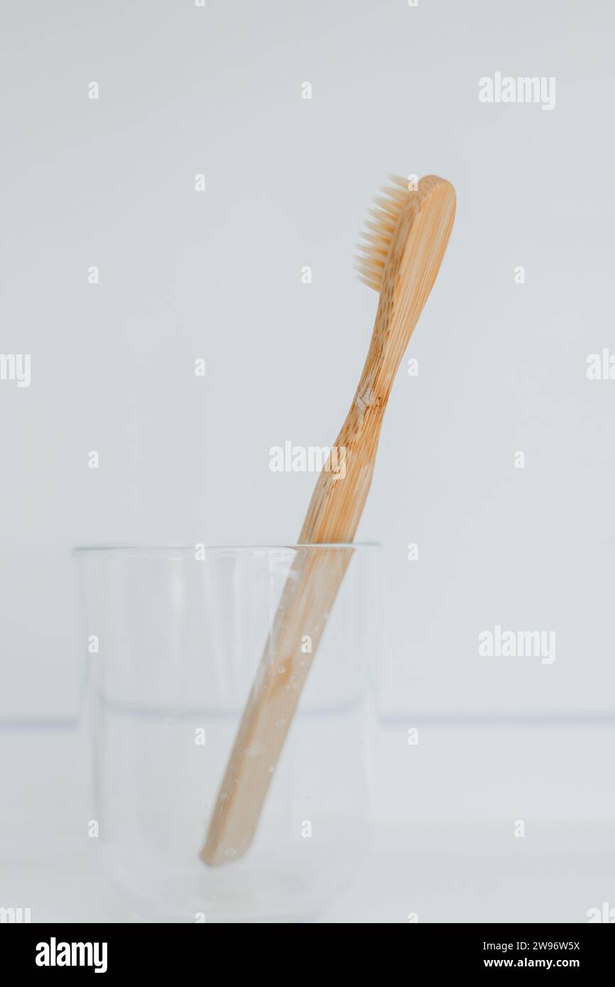 Teeth cleaning. bamboo Toothbrush in bathroom. toothbrush in a ...