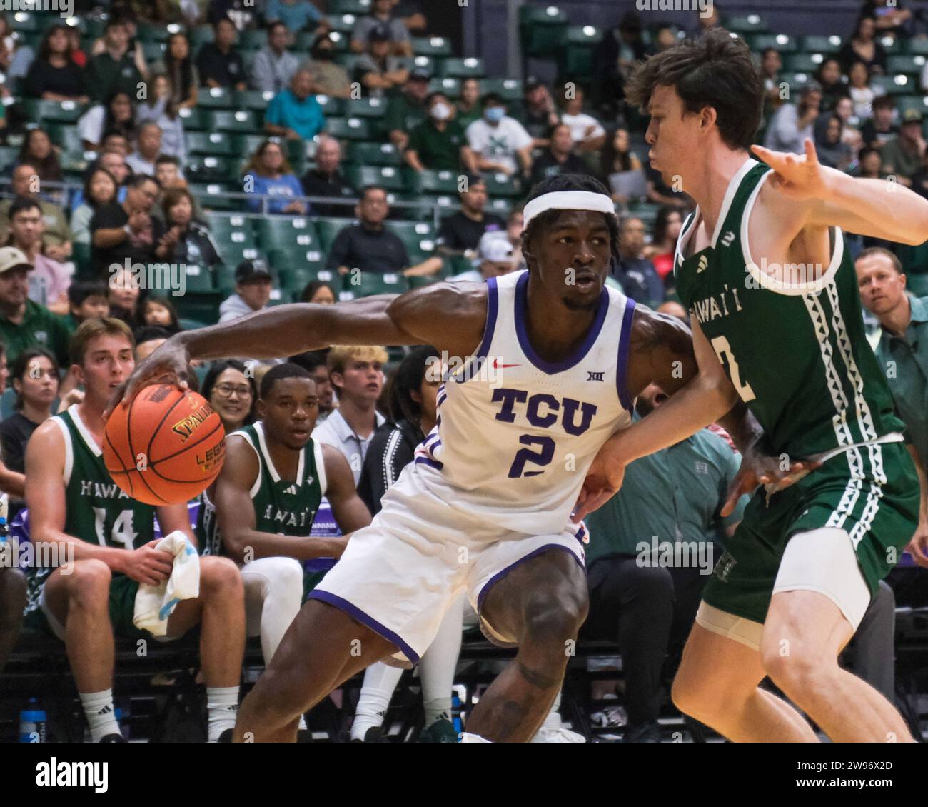 Honolulu, Hawaii, USA. 24th Dec, 2023. TCU forward Emanuel Miller (2 ...