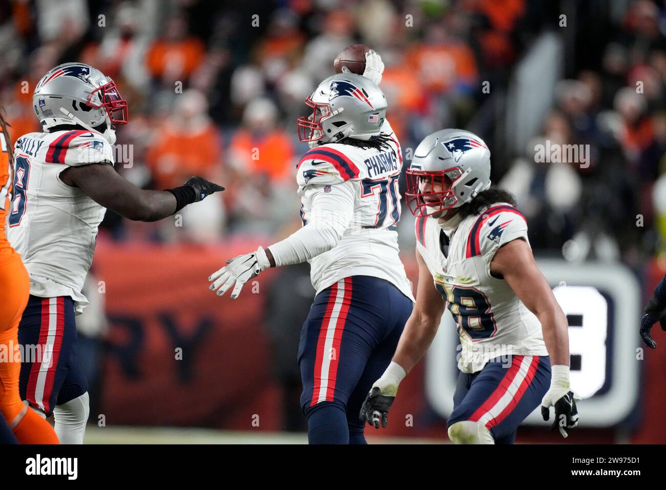 New England Patriots defensive tackle Jeremiah Pharms Jr. (70) reacts ...