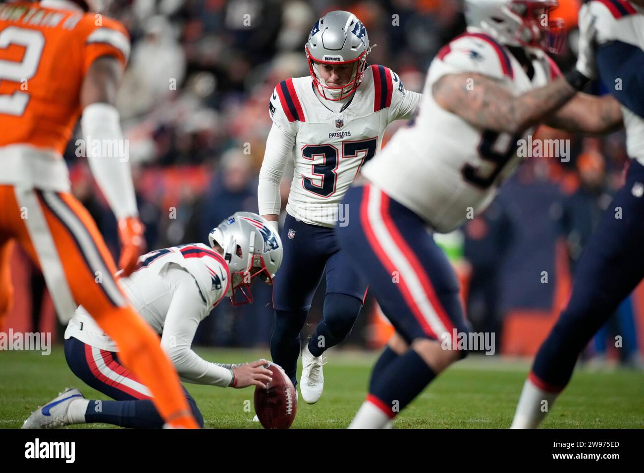 New England Patriots place-kicker Chad Ryland (37) kicks a field goal ...