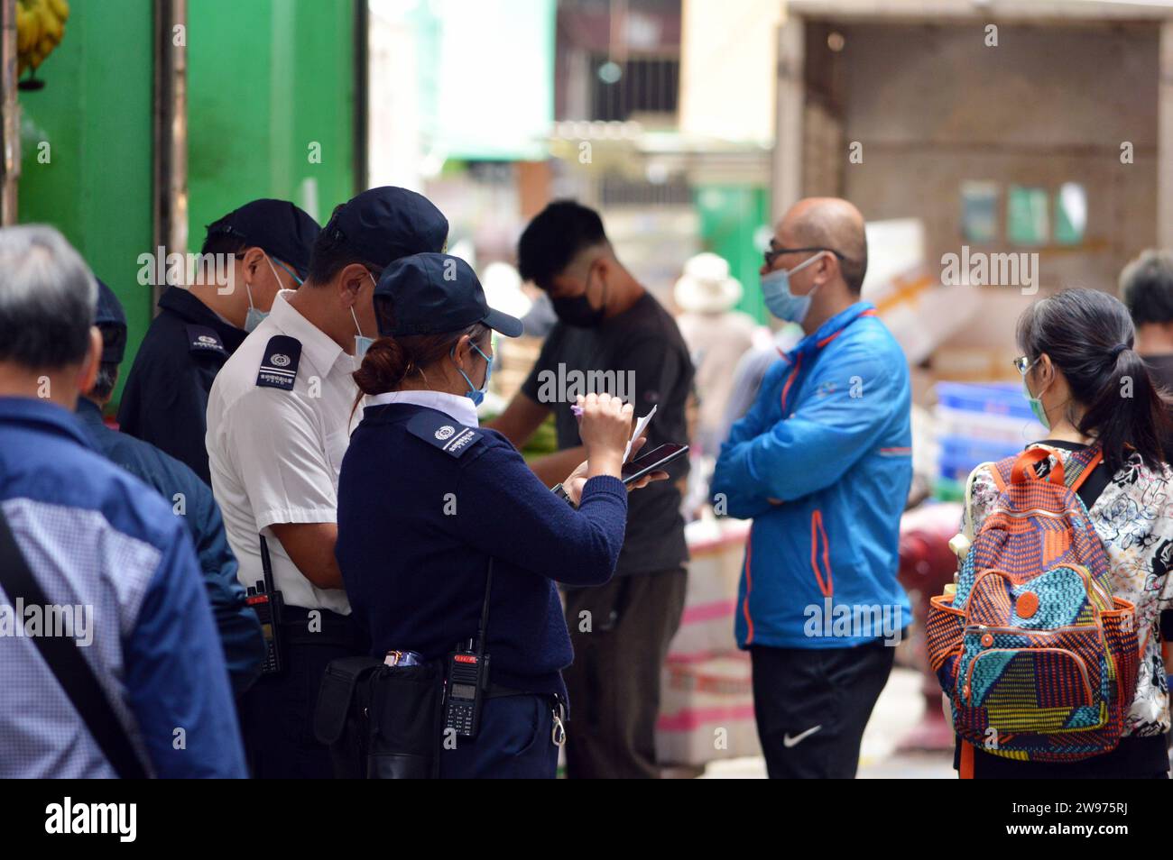 Food and Environmental Hygiene Department (食物環境衞生署, 食環署, FEHD) officers ...