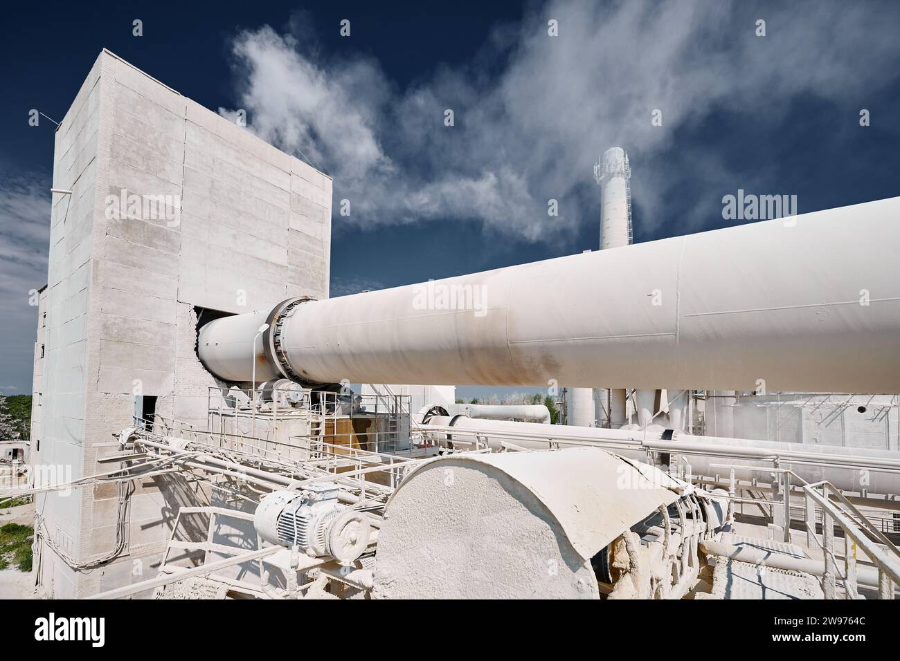 Building of loading device of roasting rotary furnace Stock Photo - Alamy