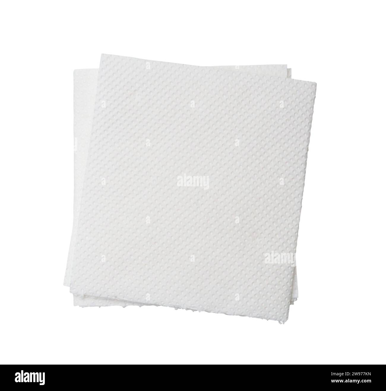Two folded pieces of white tissue paper or napkin in stack are isolated ...