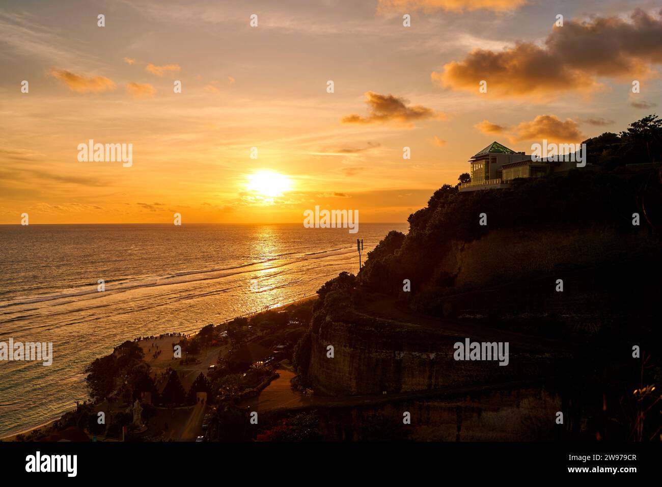 The view of the mountain and the ocean at sunset. A sunny path over the ...