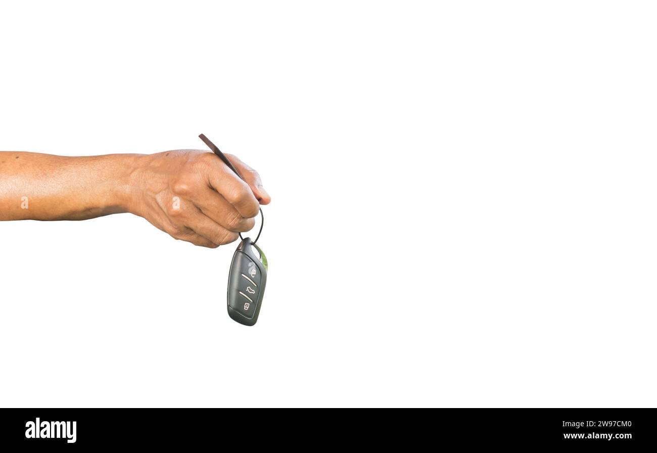 Car seller or dealer's hand handing over digital car key to customer or ...