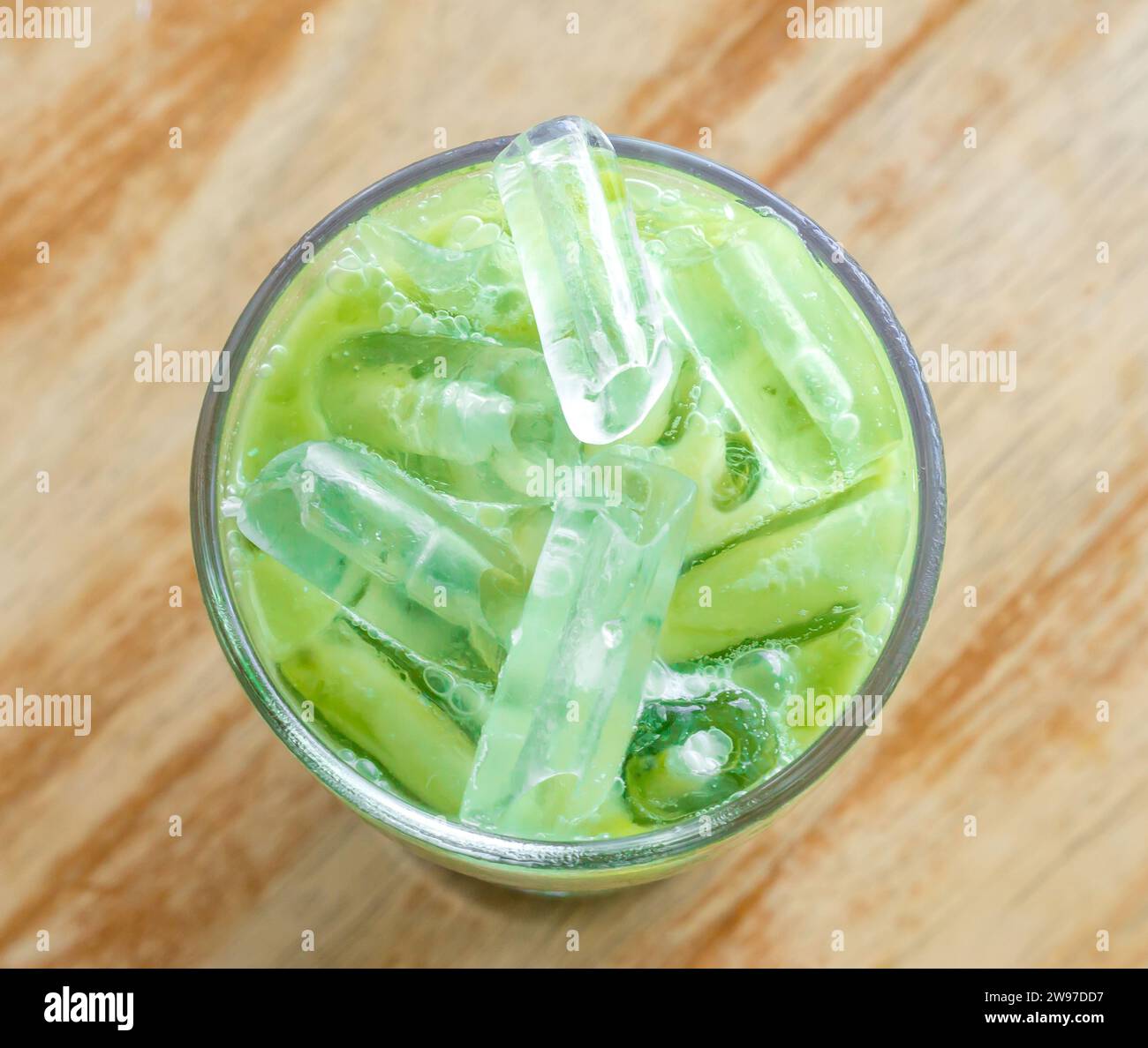 Top view of iced matcha latte or condensed milk-added green tea in ...