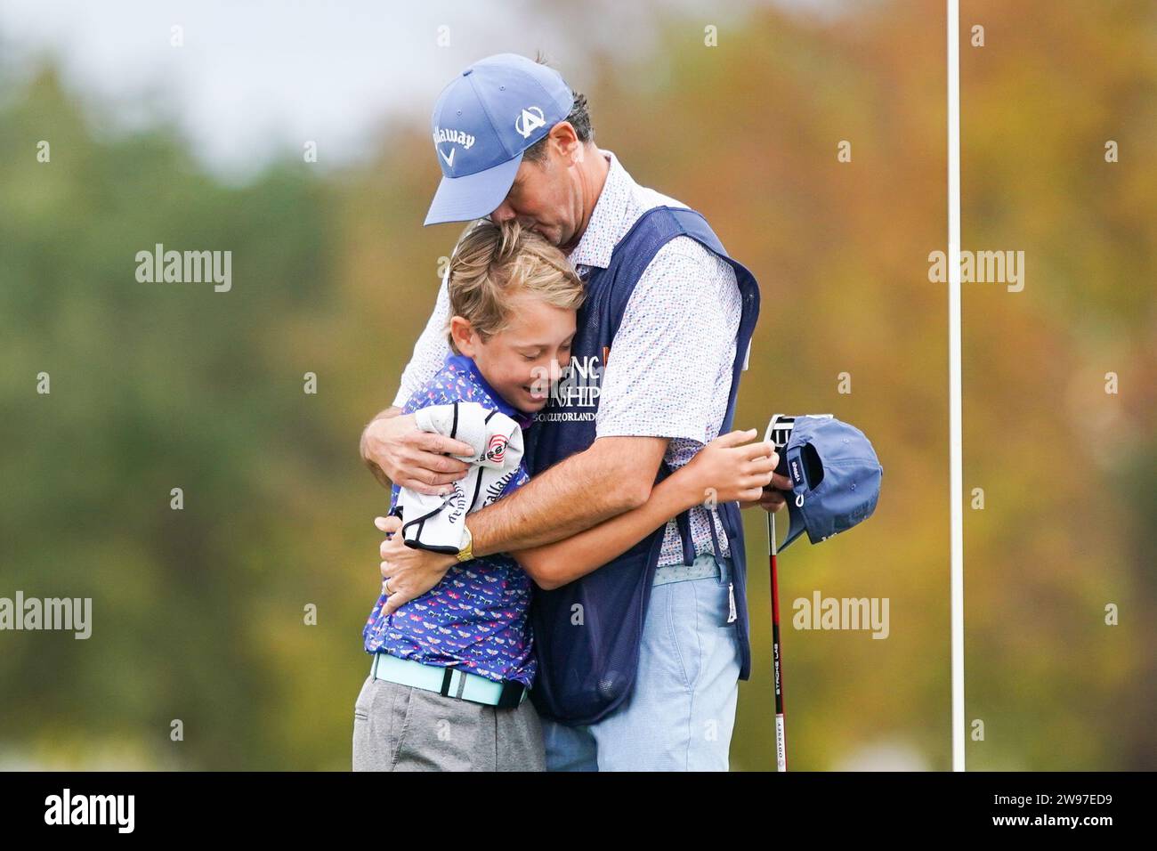Orlando, Florida, USA. 17th Dec, 2023. Mike McGee (R) and his son, Will ...