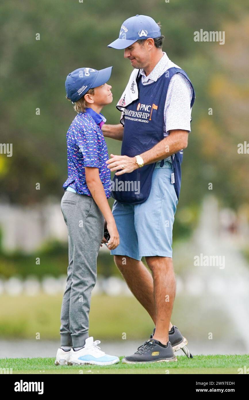 Orlando, Florida, USA. 17th Dec, 2023. Mike McGee (R) and his son, Will ...