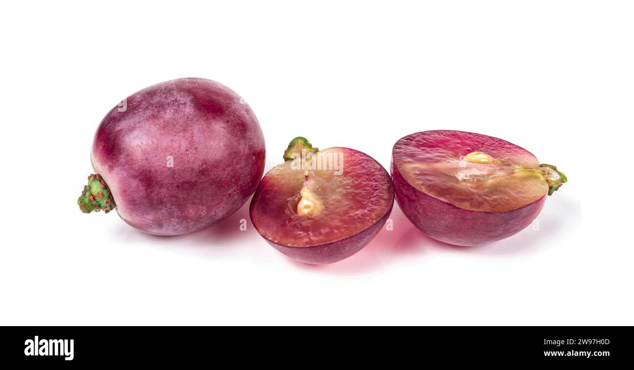 red grapes and half sliced isolated on white background Stock Photo - Alamy