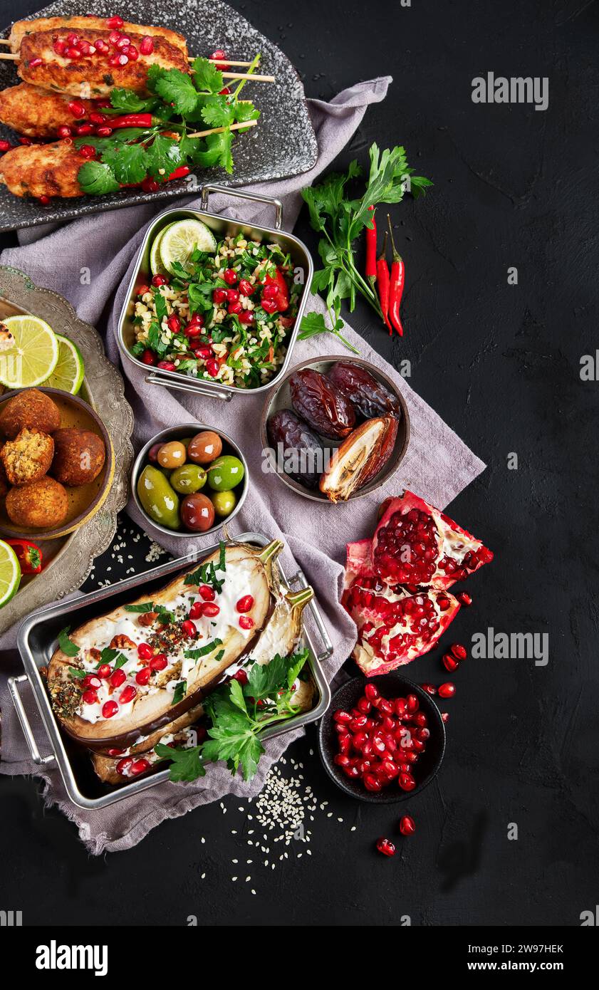 Middle eastern or Arabic different dishes on black background. Tasty ...