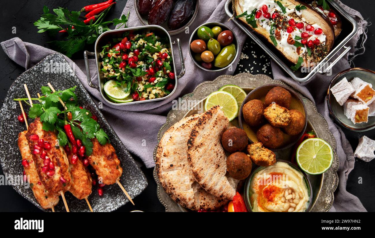 Middle eastern or Arabic different dishes on black background. Tasty ...