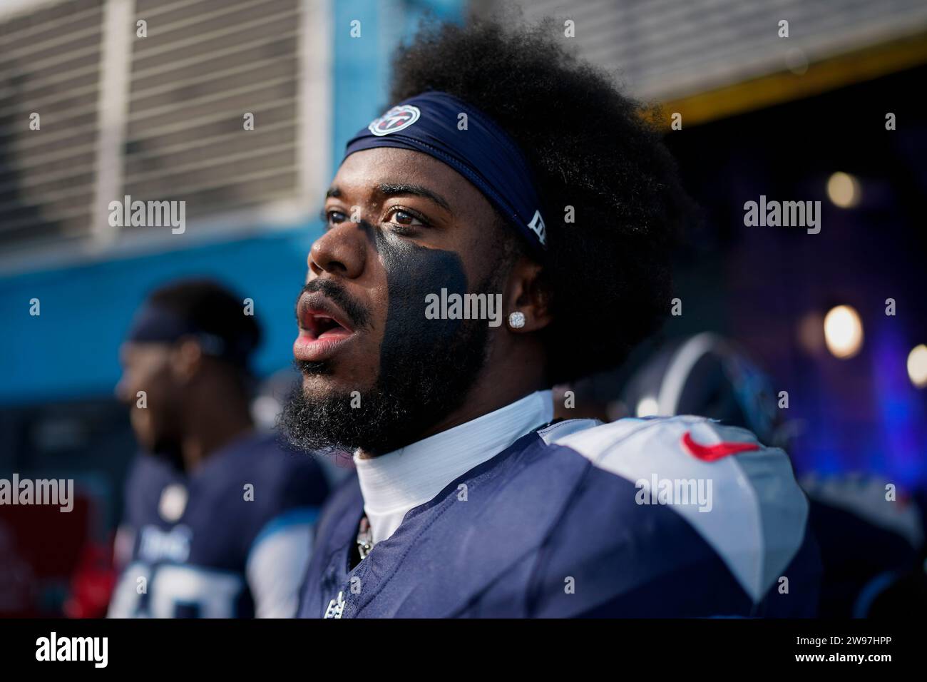 Tennessee Titans linebacker Azeez Al-Shaair looks onto the field before ...