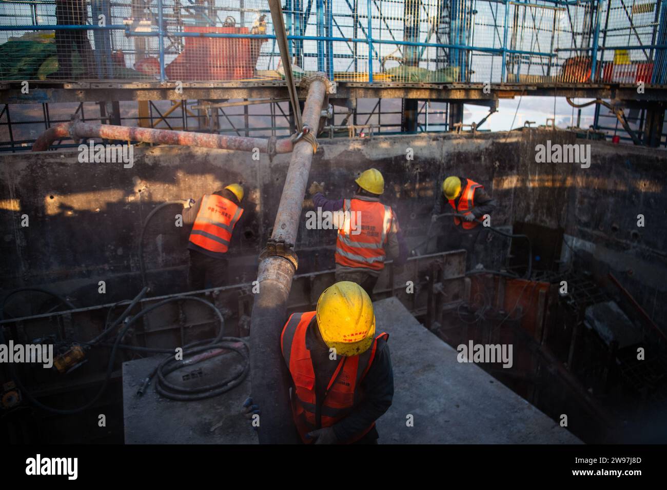 Shiyan, China's Hubei Province. 24th Dec, 2023. Laborers work at the ...