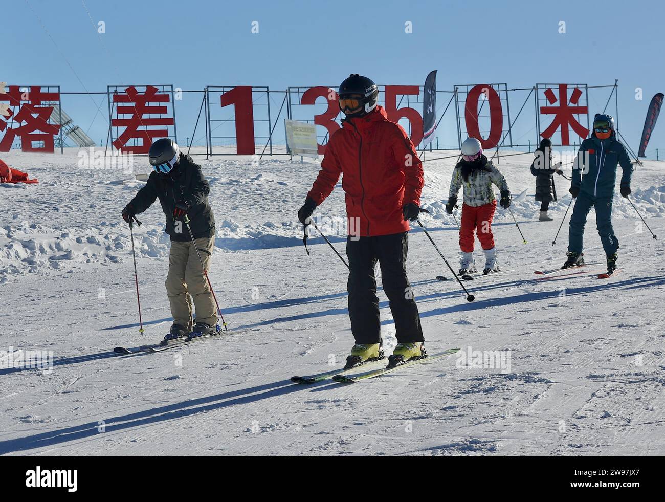 **CHINESE MAINLAND, HONG KONG, MACAU AND TAIWAN OUT** Tourists ski at ...