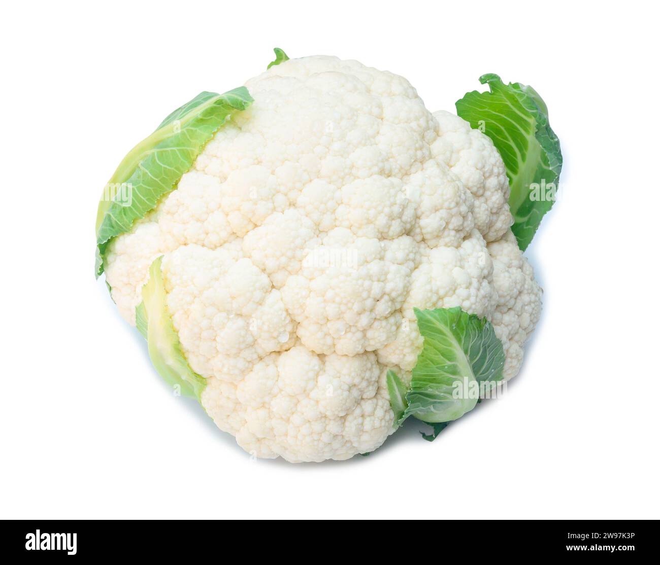 Single fresh ripe white cauliflower head with some green leaves is ...