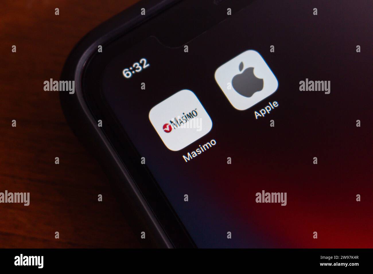 Masimo and Apple logos seen in iPhone. In Dec, Apple paused selling new ...