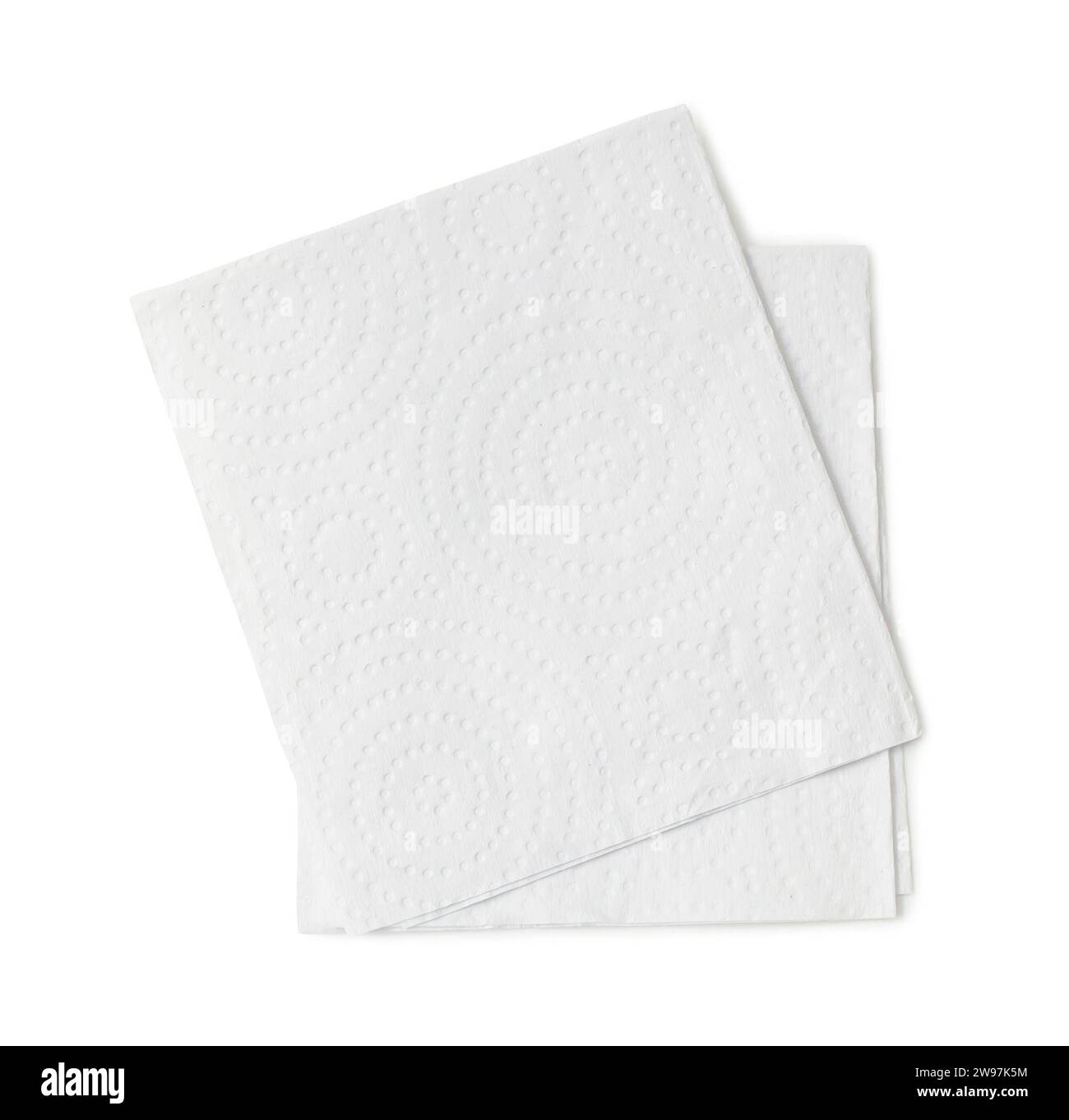 Two folded pieces of white tissue paper or napkin in stack tidily ...