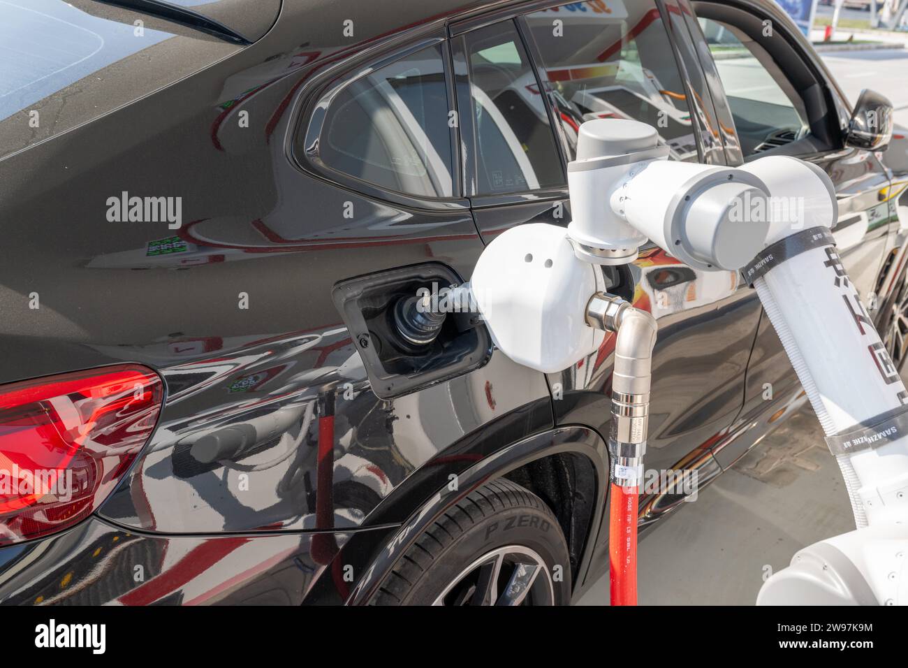 SUZHOU, CHINA - DECEMBER 25, 2023 - An intelligent refueling robot ...