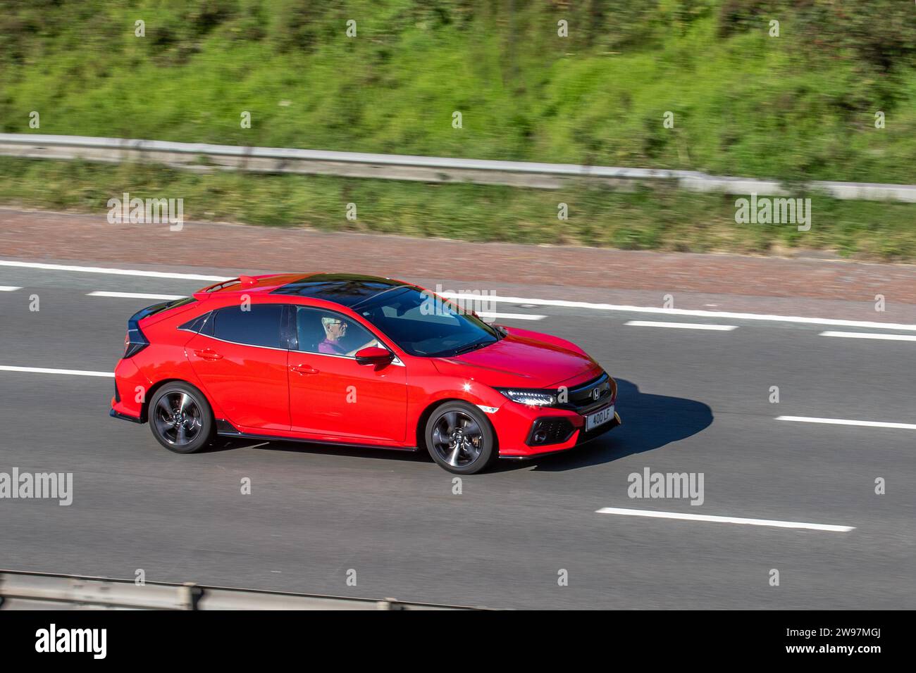 2022 Honda Civic Sport Hybrid Electric 1993 cc car travelling at speed ...