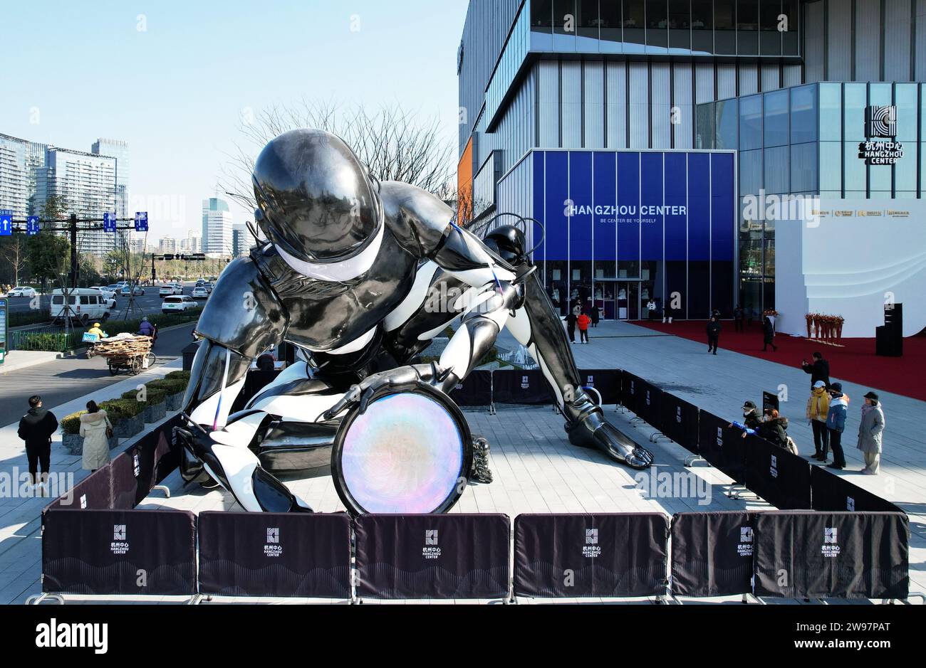 Hangzhou, China. 25th Dec, 2023. Citizens are watching ''Resonance of ...