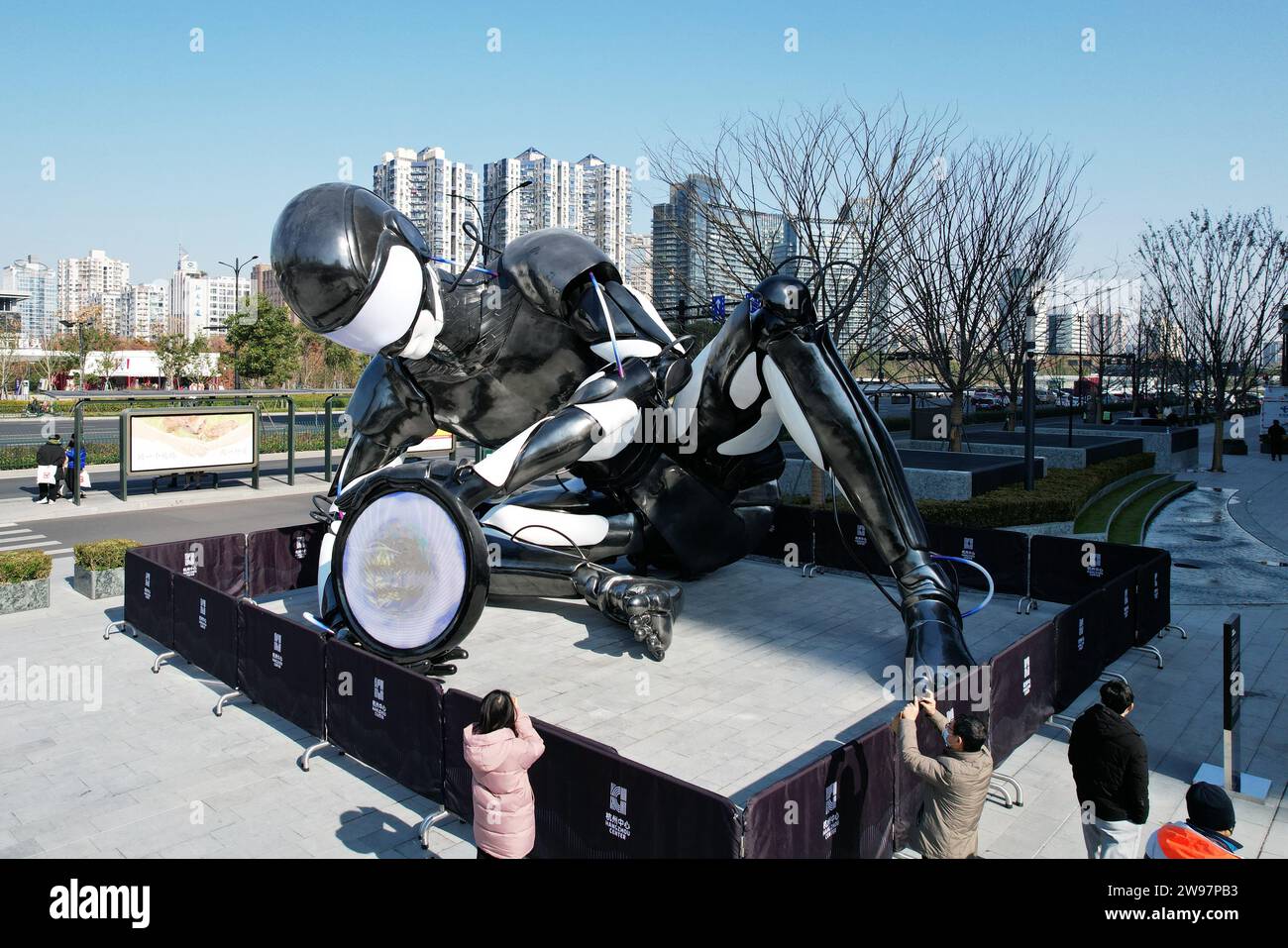Hangzhou, China. 25th Dec, 2023. Citizens are watching ''Resonance of ...