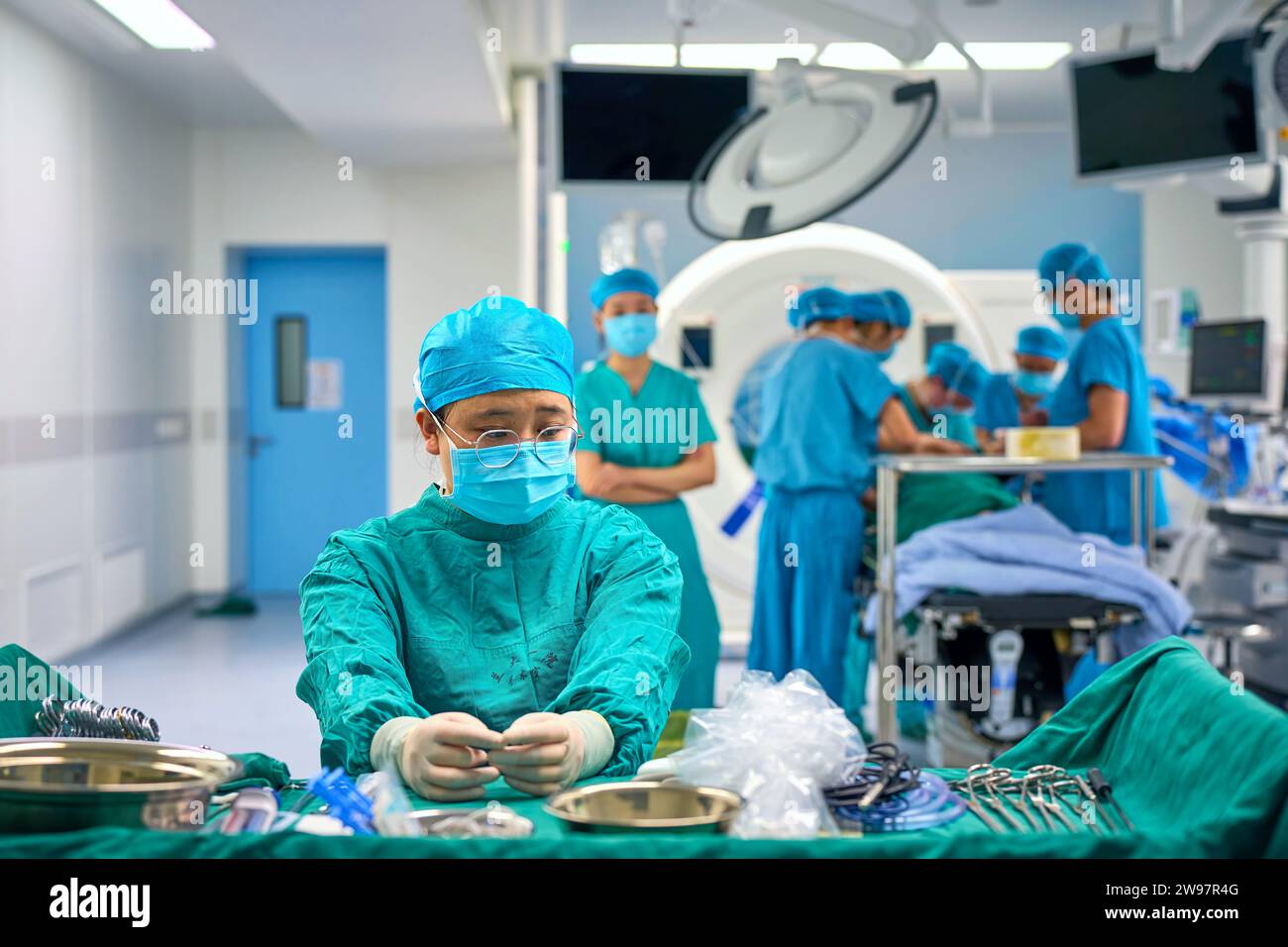 Asian surgeons work in a modern operating room Stock Photo - Alamy