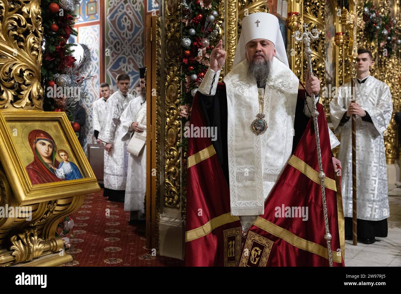 Kyiv, Ukraine. 24th Dec, 2023. Metropolitan Epiphanius (C) of Kyiv ...