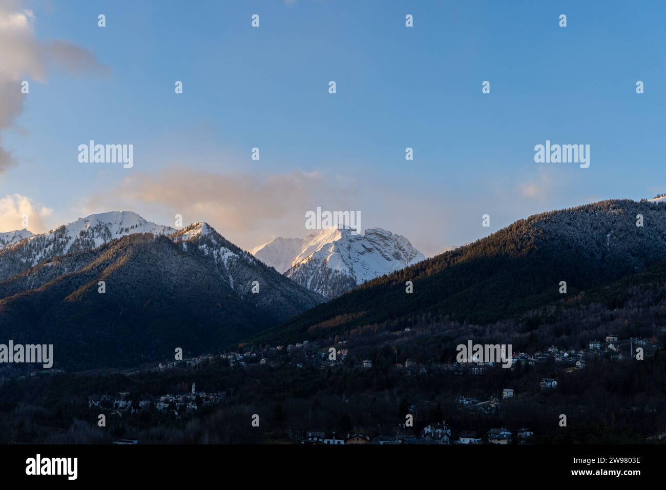 A stunning image of a snow-capped mountain range in brilliant sunshine ...