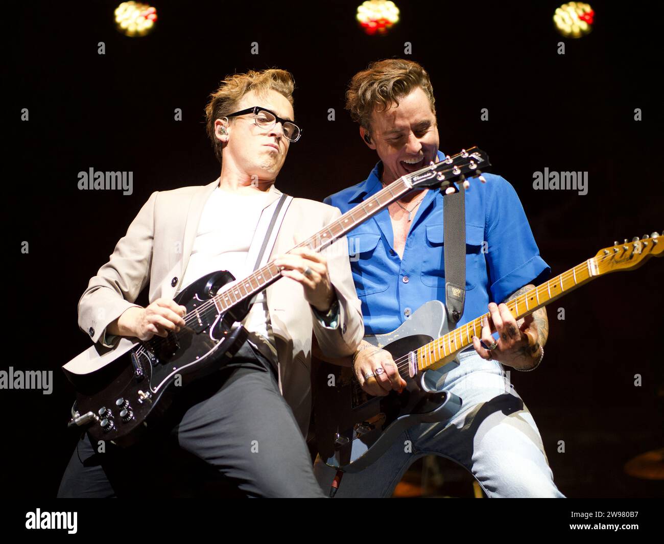 Danny Jones and Tom Fletcher of band McFly playing guitar at Newmarket ...