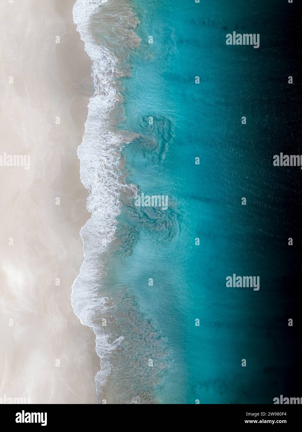 An aerial view of the sea waves rolling into a sandy shore in Western Australia Stock Photo - Alamy