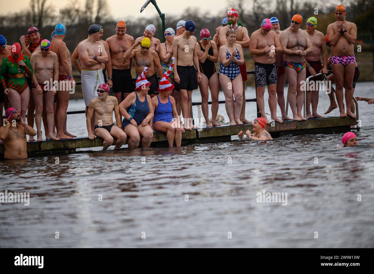 Swimmers gather early for the UK’s traditional Christmas morning swimming race in London’s ...