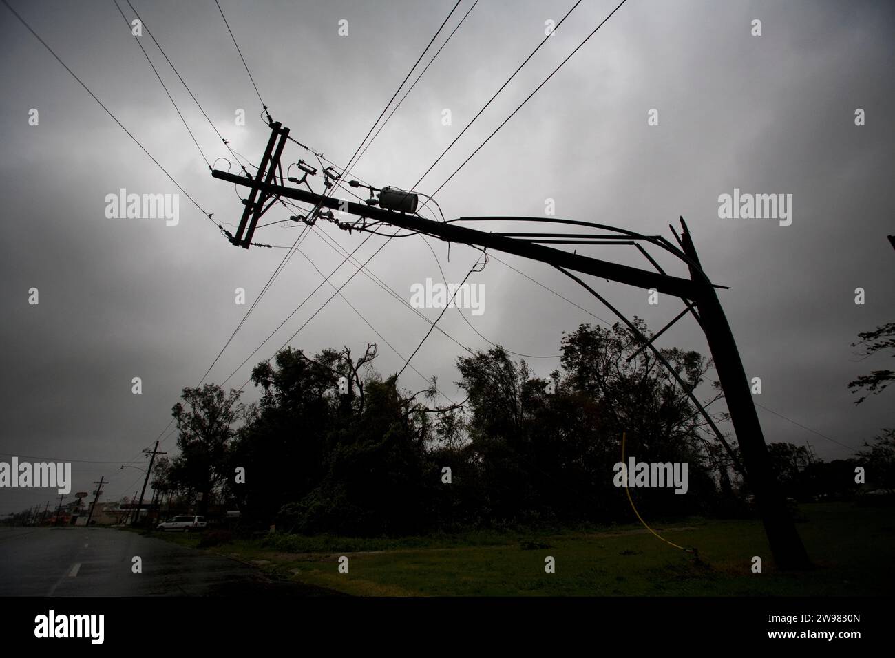 Broken power line in the town of Houma still hanging in the wake of ...