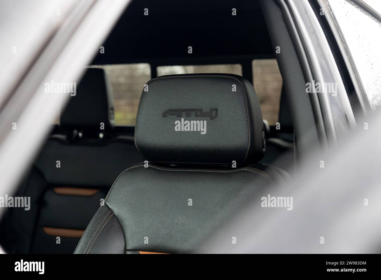 A close-up of an open door and seat of a GMC AT4 off-road truck Stock ...