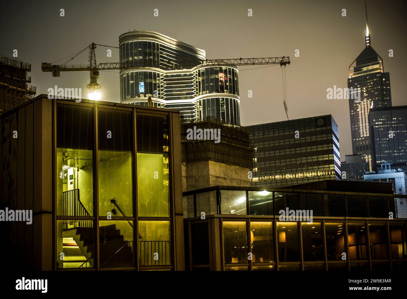 Thick cluster of apartment and commercial buildings in a dense city ...