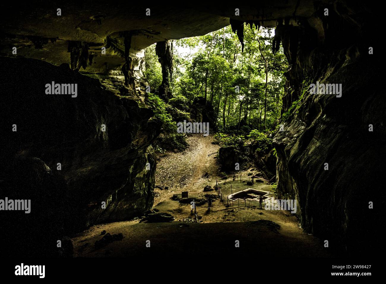 An opening to the outside from inside a cave Stock Photo - Alamy