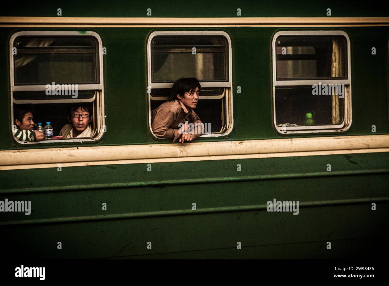 Passengers leaning out of the windows hi-res stock photography and ...