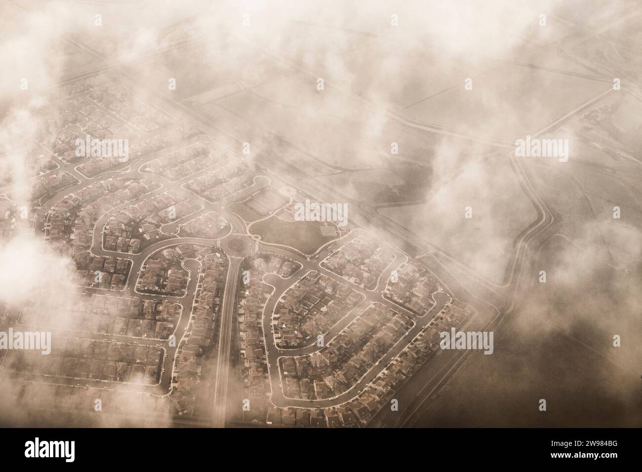 Sprawling suburb with clouds Stock Photo - Alamy