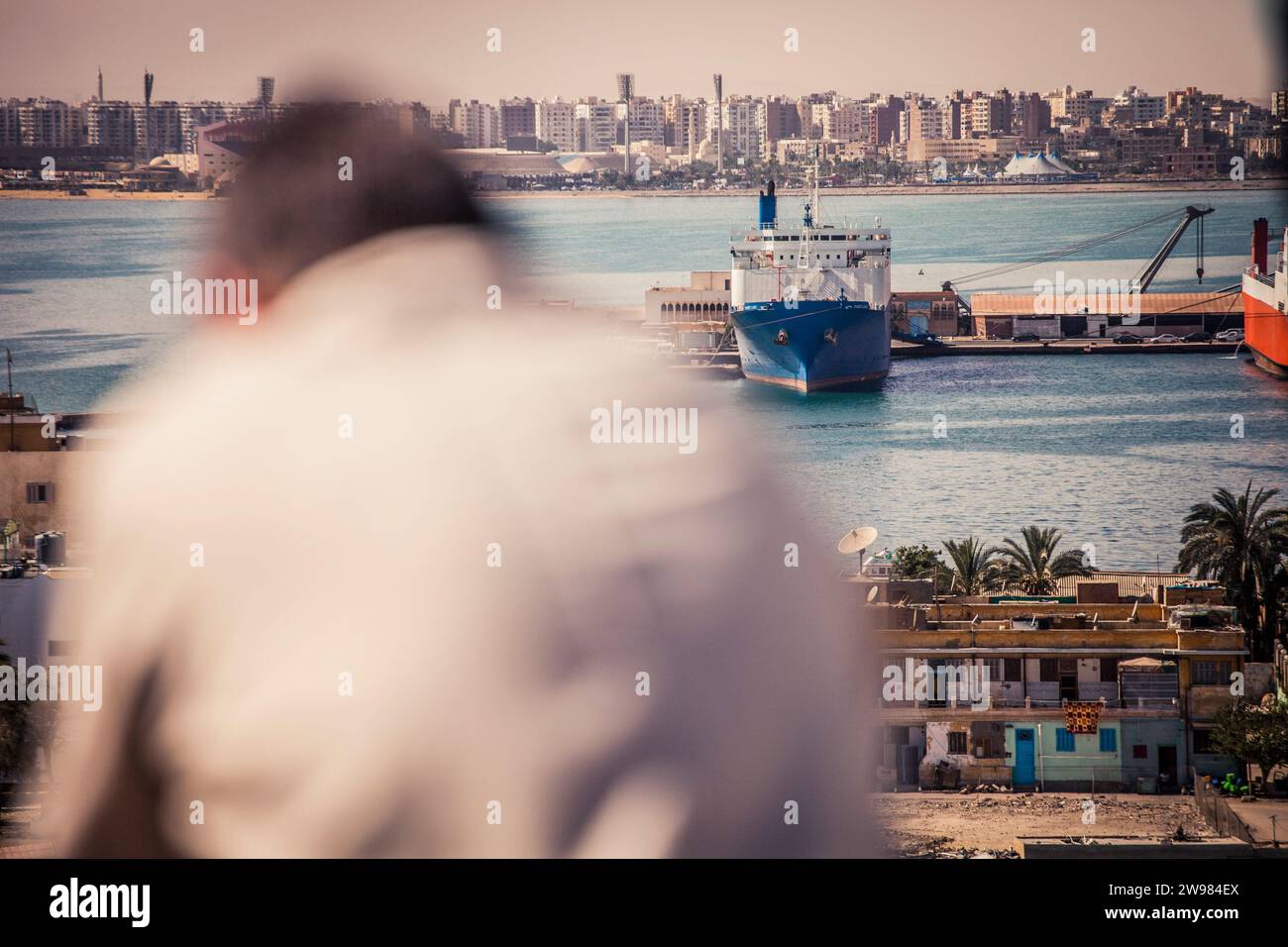 Captain of a container ship piloting the vessel through the Suez Canal ...