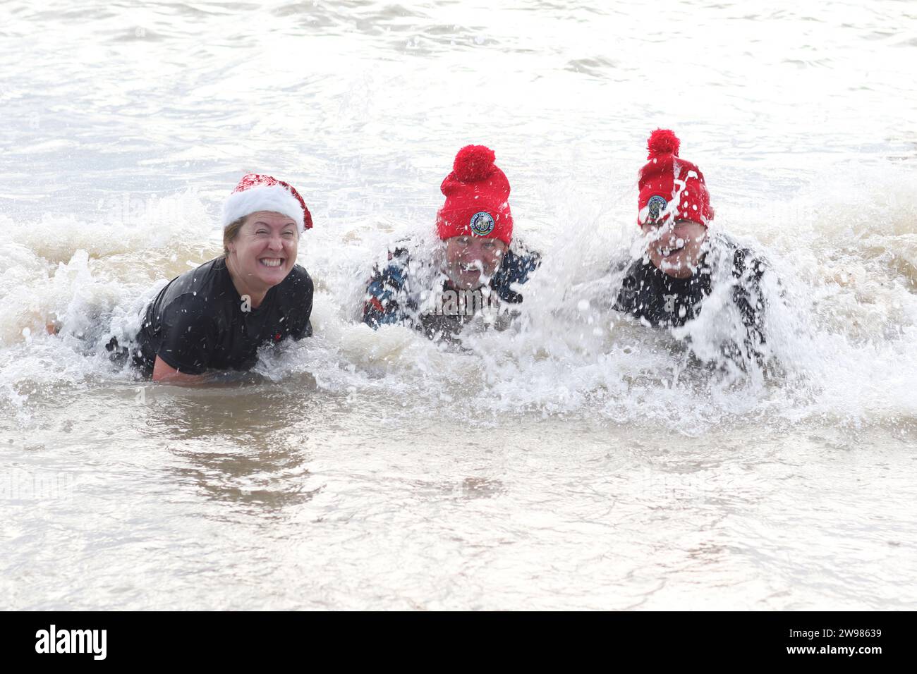 The annual Christmas Day Swim took place today with swimmers braving ...