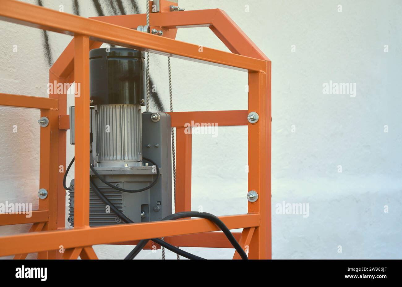 Hoist supply and safety lock as part of suspended wire rope platform ...