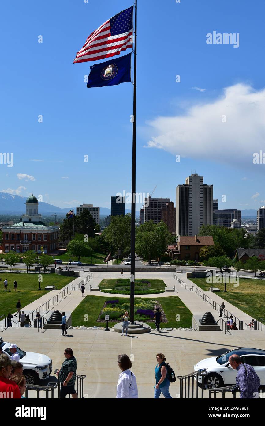 The American and Utah State flag on display in front of the Utah State ...