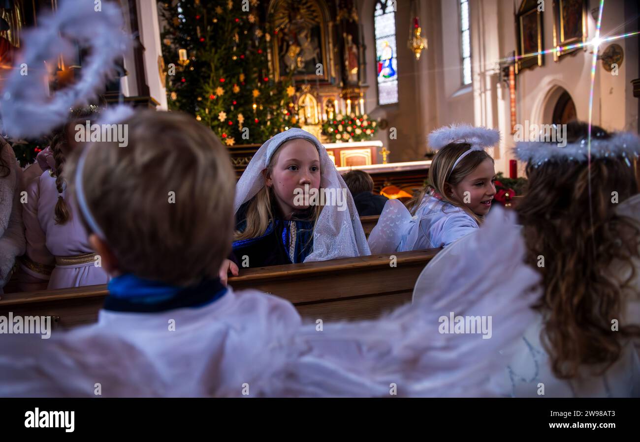Children take part in a Nativity play in a local church in Germany ...