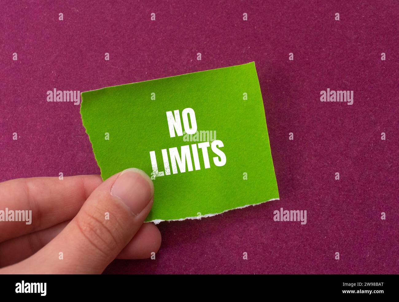 No limits lettering on ripped paper Stock Photo - Alamy