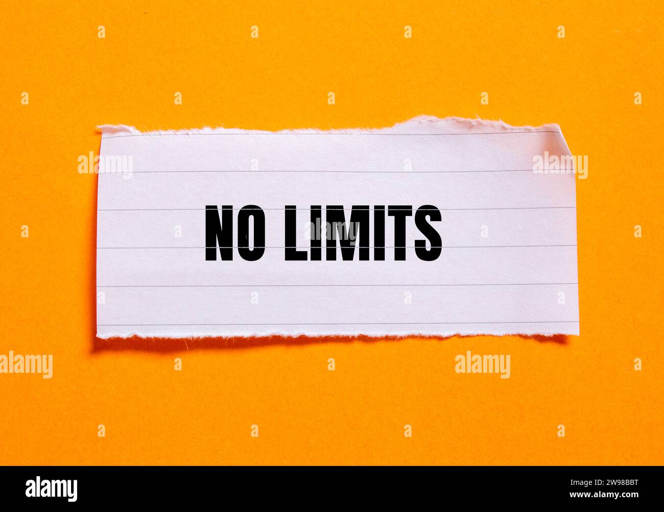 No limits lettering on ripped paper Stock Photo - Alamy