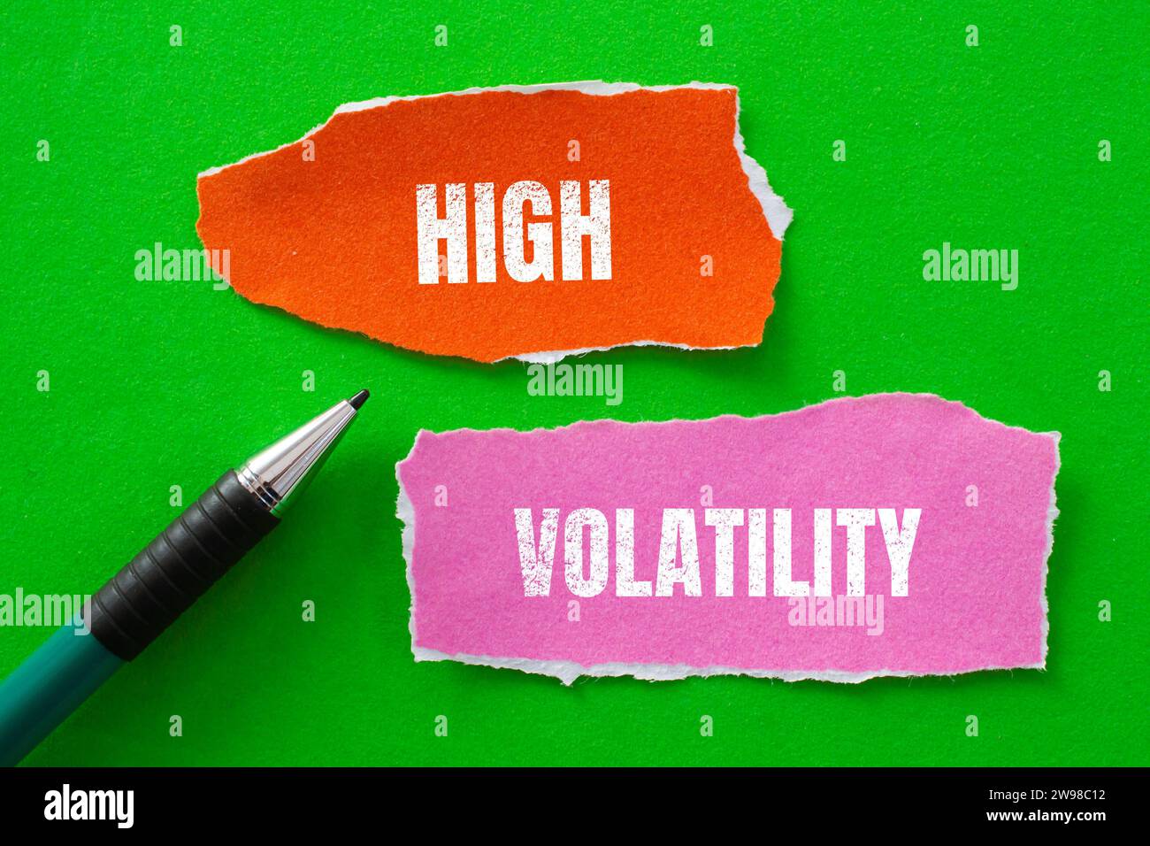 High volatility lettering on ripped paper. Business concept Stock Photo ...