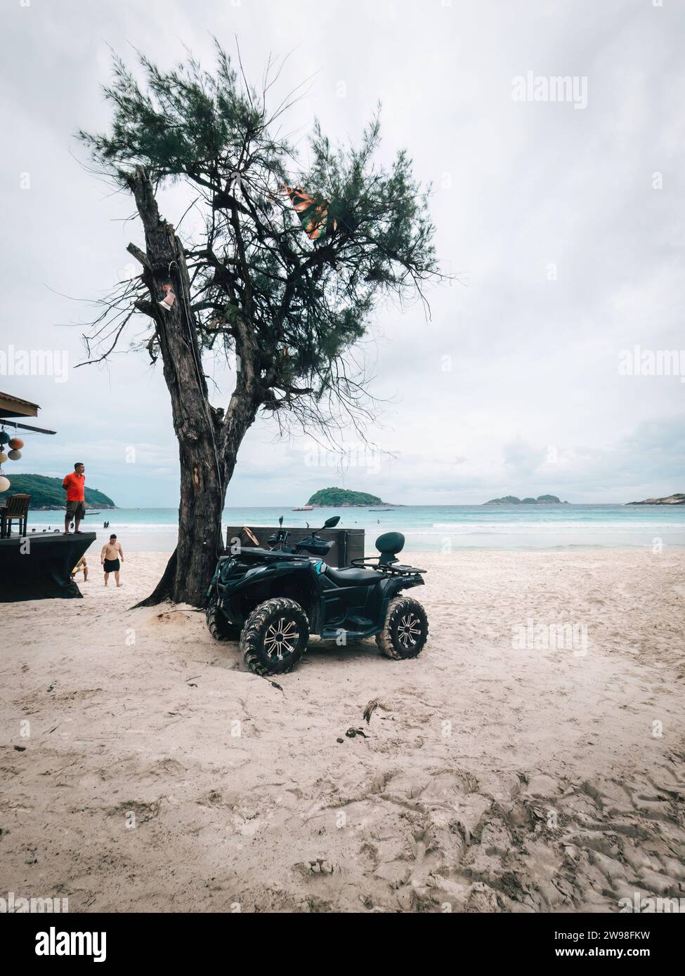 A quad parked by the beach near the resort Stock Photo - Alamy